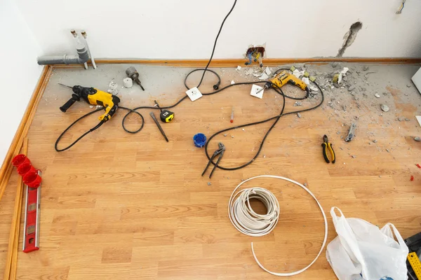 Socket repair process with drill Stock Photo by ©Garsya 87940818