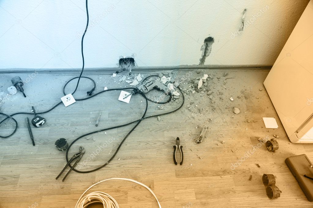 Socket repair process with drill Stock Photo by ©Garsya 87940818