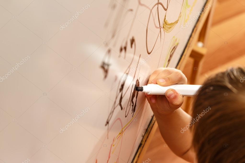 Hand drawing on whiteboard Stock Photo by ©Garsya 92540446