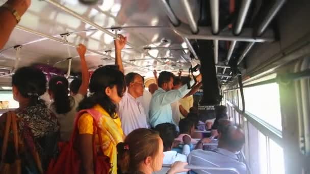Woman inside a crowded bus — Stock Video © paulprescott #57903757