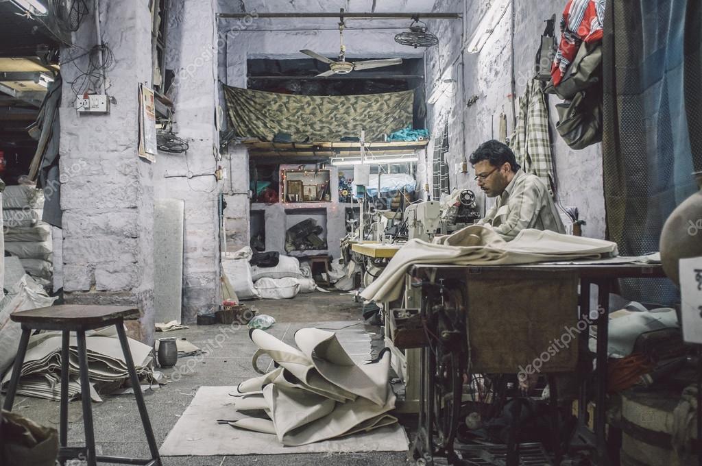 Tailor at work in textile factory – Stock Editorial Photo ...