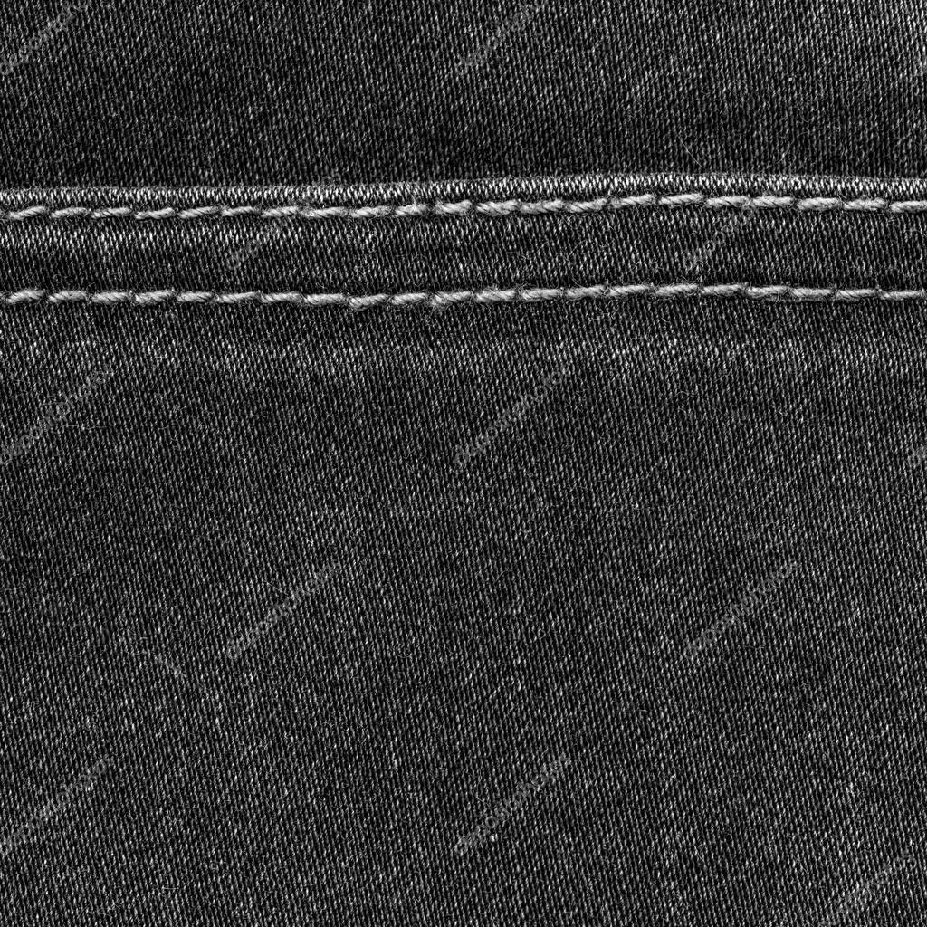 Black denim texture, decorated with seams — Stock Photo © natalt #82241080