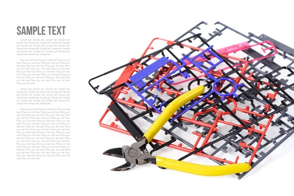 Closeup plastic sprue Stock Photo by ©norgallery 117734978