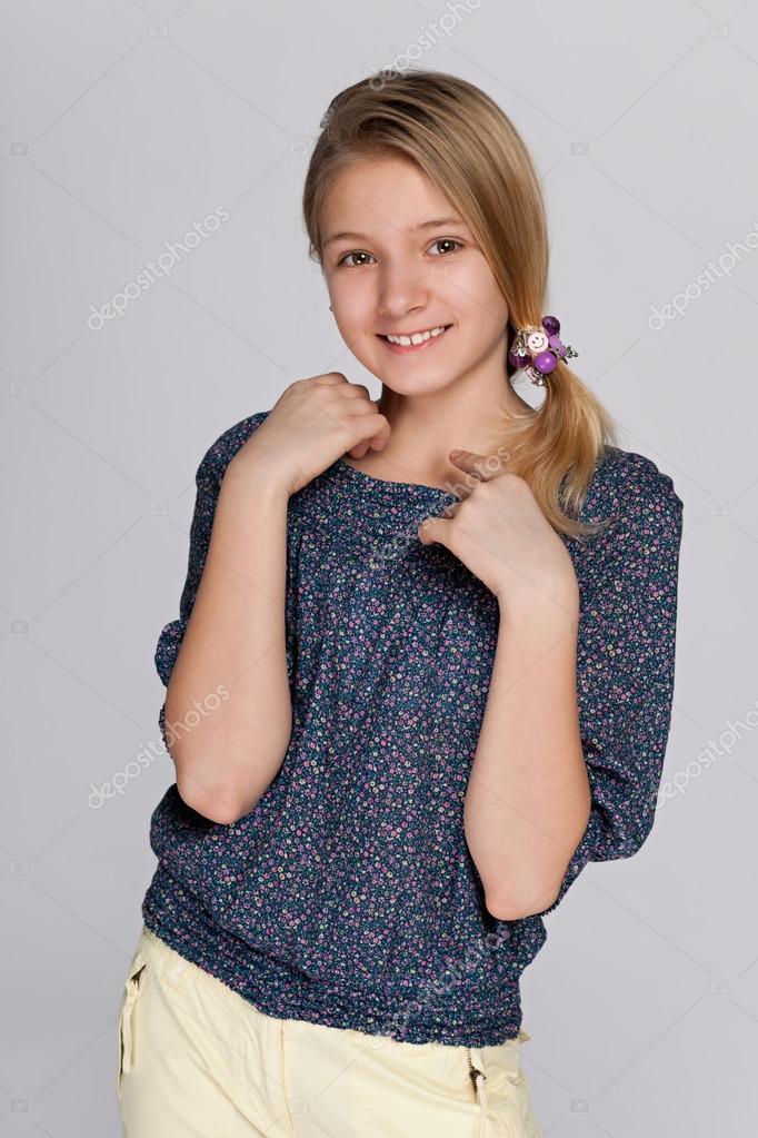 Adorable smiling preteen girl — Stock Photo © SergiyN #52198903 Adorable smiling preteen girl — Stock Photo © SergiyN #52198903