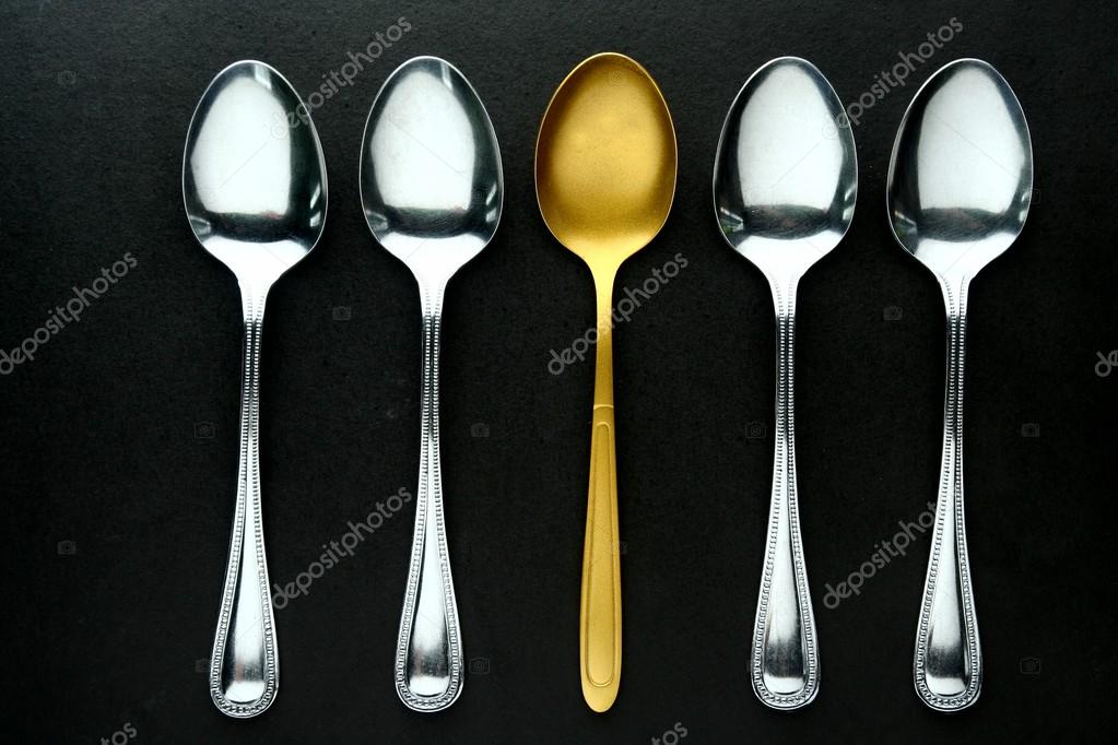 Golden Spoon among ordinary spoons Stock Photo by ©junpinzon 63359979