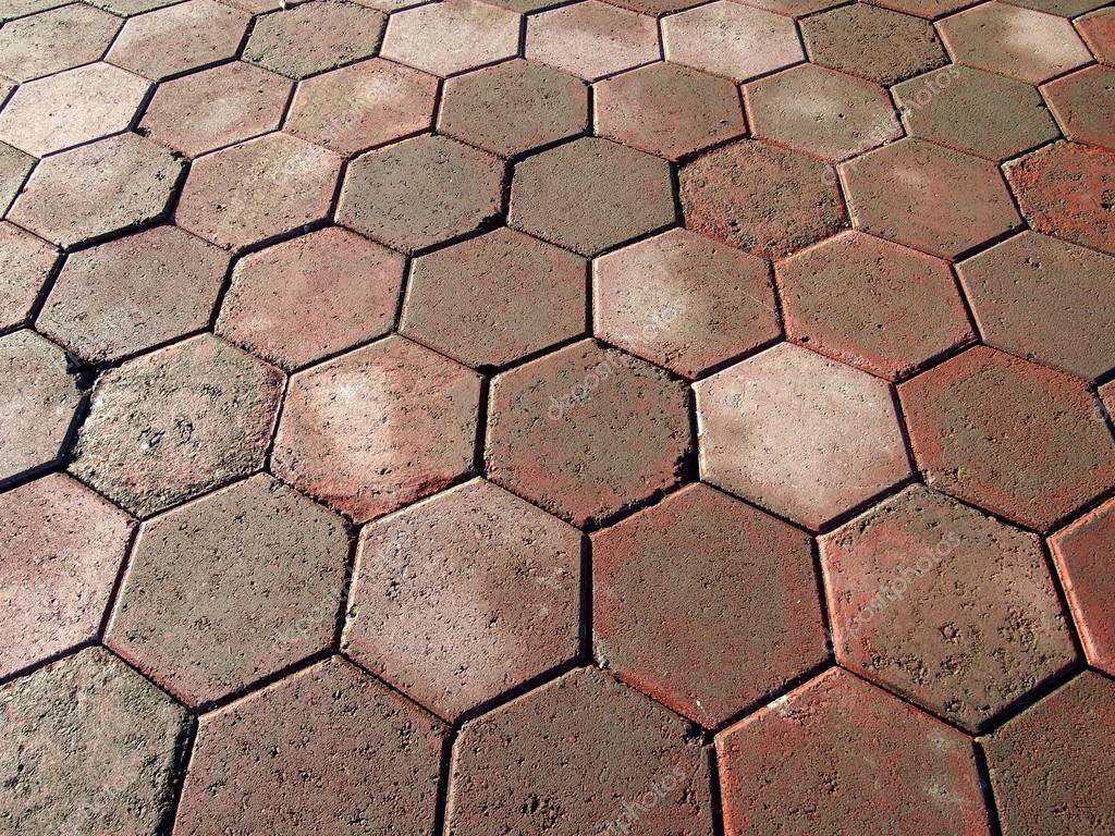 Hexagonal shaped bricks on a walkway — Stock Photo © junpinzon #90207290