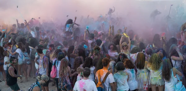People dancing in colored war event, Larnaca, Cyprus - Stock Image ...