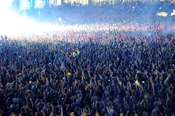 Crowd of people raising their hands at a concert — Stock Editorial ...