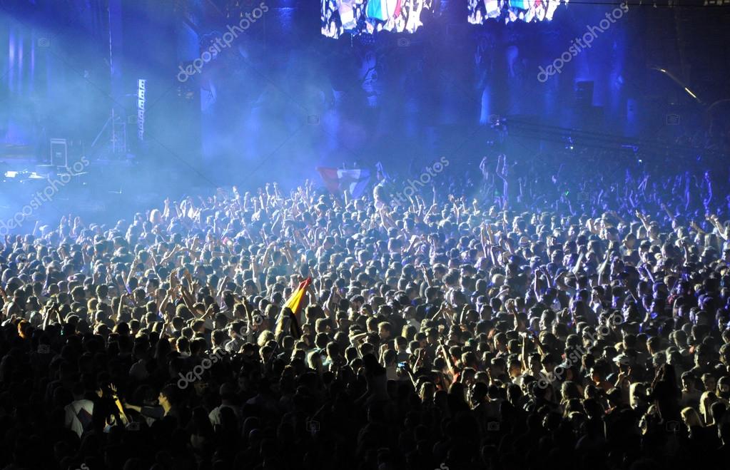 Partying crowd at a live concert — Stock Editorial Photo © salajean ...