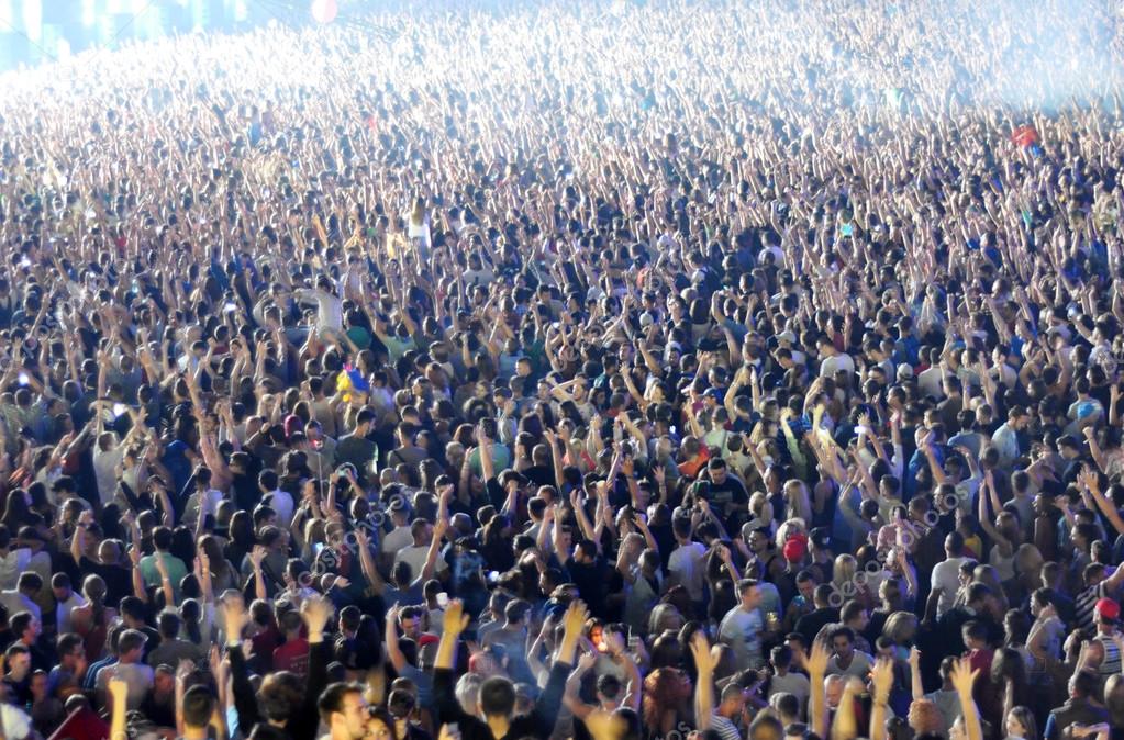 Partying crowd at a concert — Stock Editorial Photo © salajean #80348346
