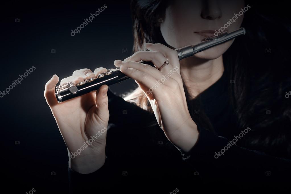 Flute piccolo with hands closeup — Stock Photo © alenavlad #61520783