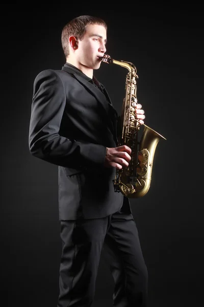 Saxophone player Saxophonist with sax alto Stock Photo by ©alenavlad ...