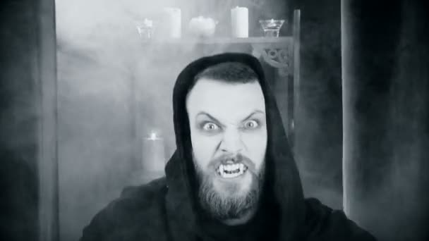 Handsome strong vampire attacking camera black and white — Stock Video ...