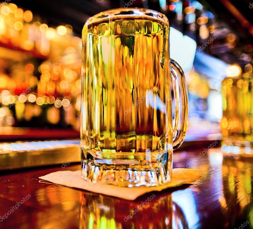 Pint of beer on a bar — Stock Photo © stu99 #60208965