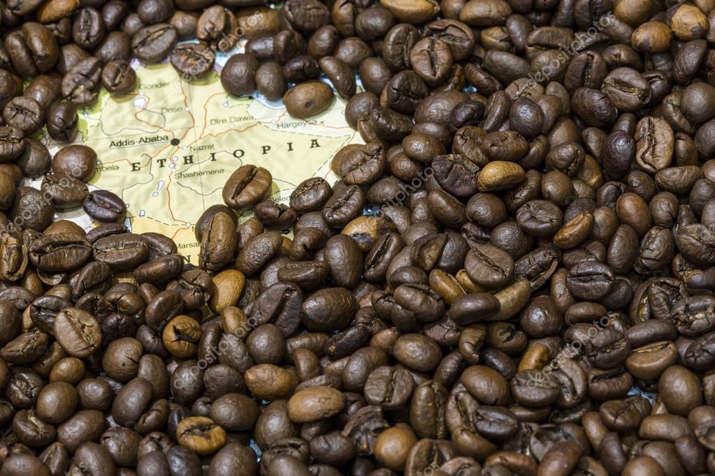 Map of Ethiopia under a background of coffee beans — Stock Photo ...