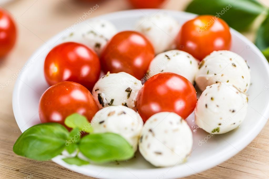 Portion of Mozzarella with Tomatoes Stock Photo by ©HandmadePicture ...