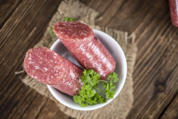 German Mettwurst on wooden background Stock Photo by ©HandmadePicture ...