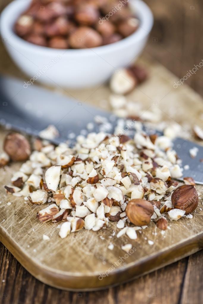 Chopped Hazelnuts on vintage background Stock Photo by ©HandmadePicture ...