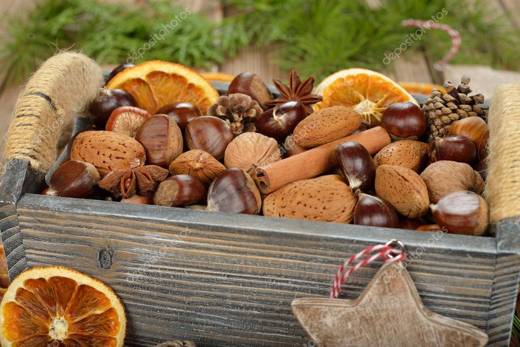 Various nuts in a box Stock Photo by ©Olyina 55464063