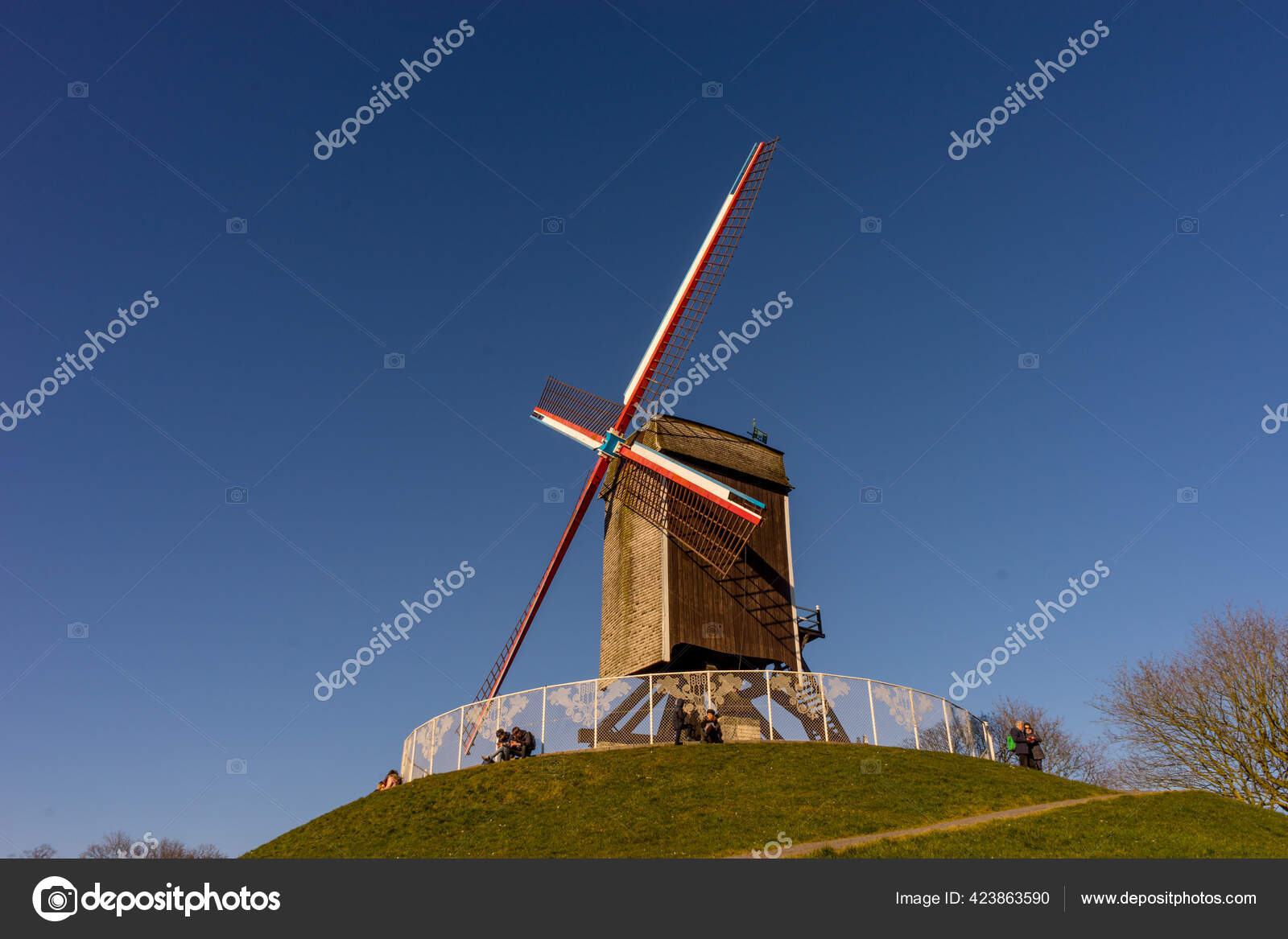 Belgium Bruges Clock Tower Top Grass Covered Field Windmill Island ...