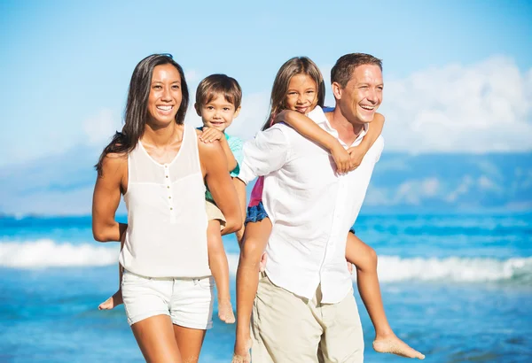Closeup of happy family at the beach — Stock Photo © Goodluz #13937221