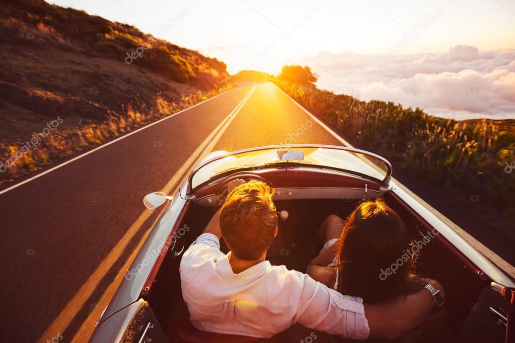 Car Driving Away Into Sunset