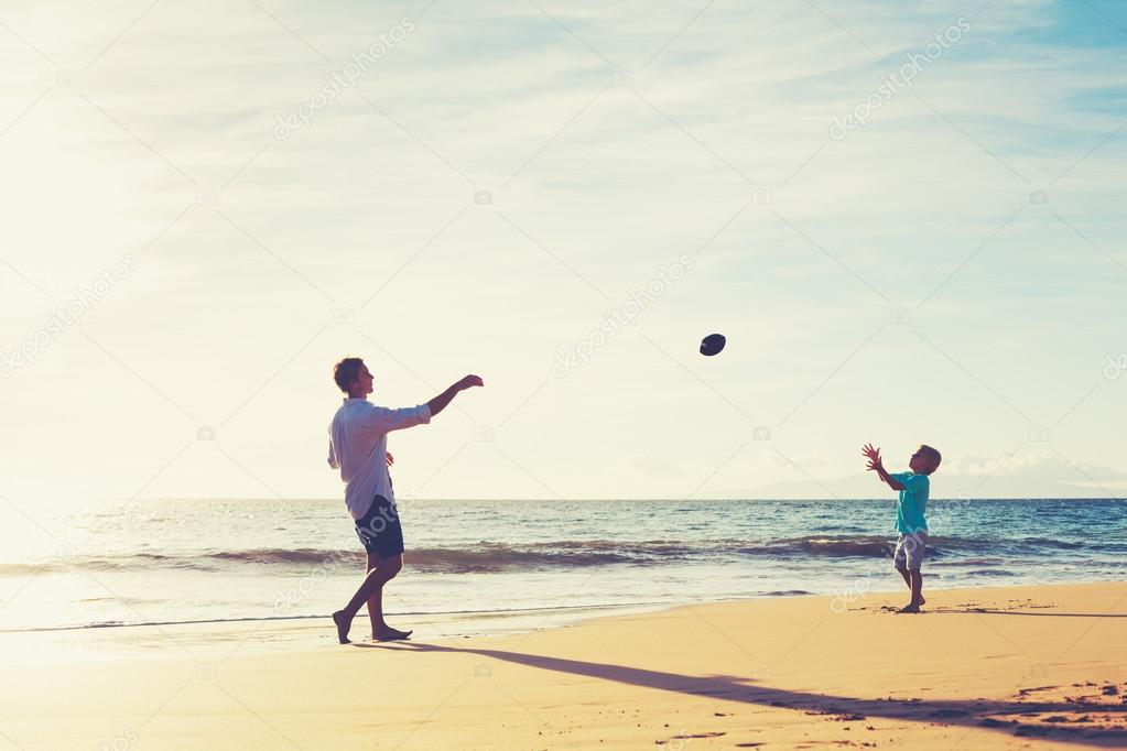 Father and Son Playing Catch Throwing Football ⬇ Stock Photo, Image by ...
