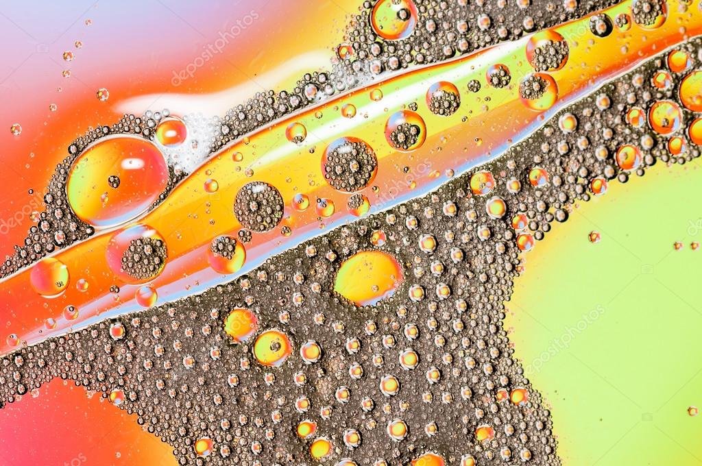Oil drops on water surface — Stock Photo © alessandrozocc #78618368