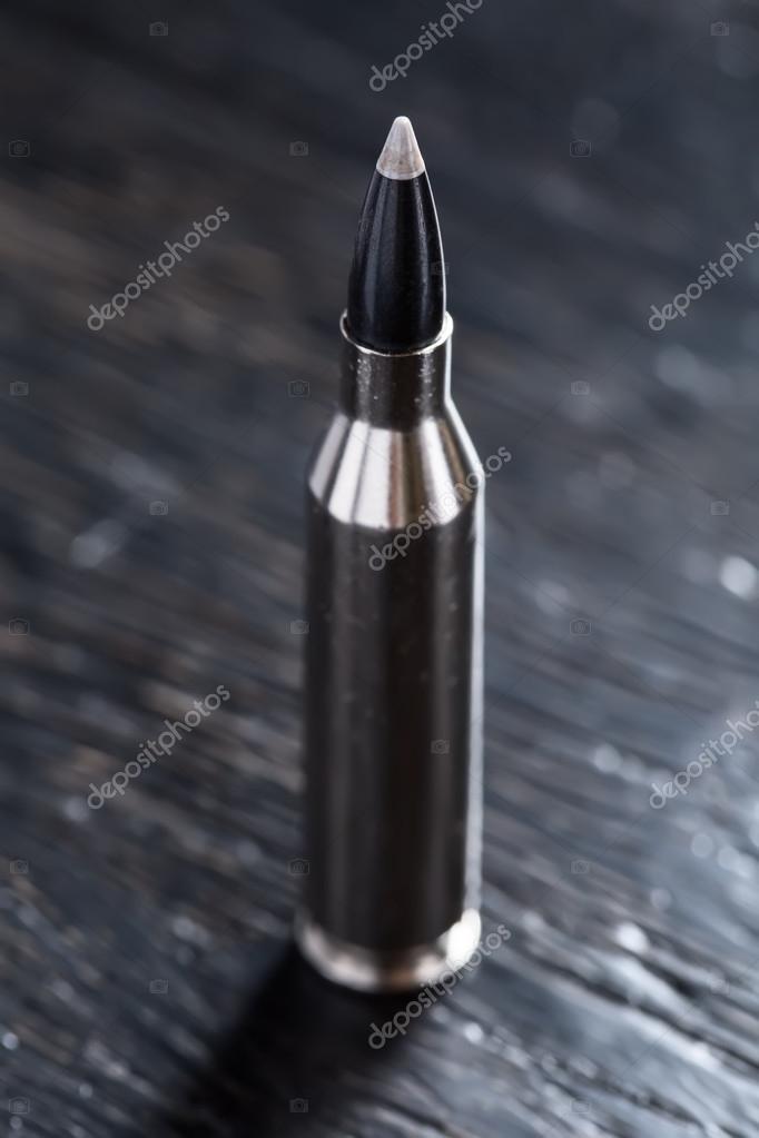 One cartridge with teflon bullet and silver sleeve Stock Photo by ...