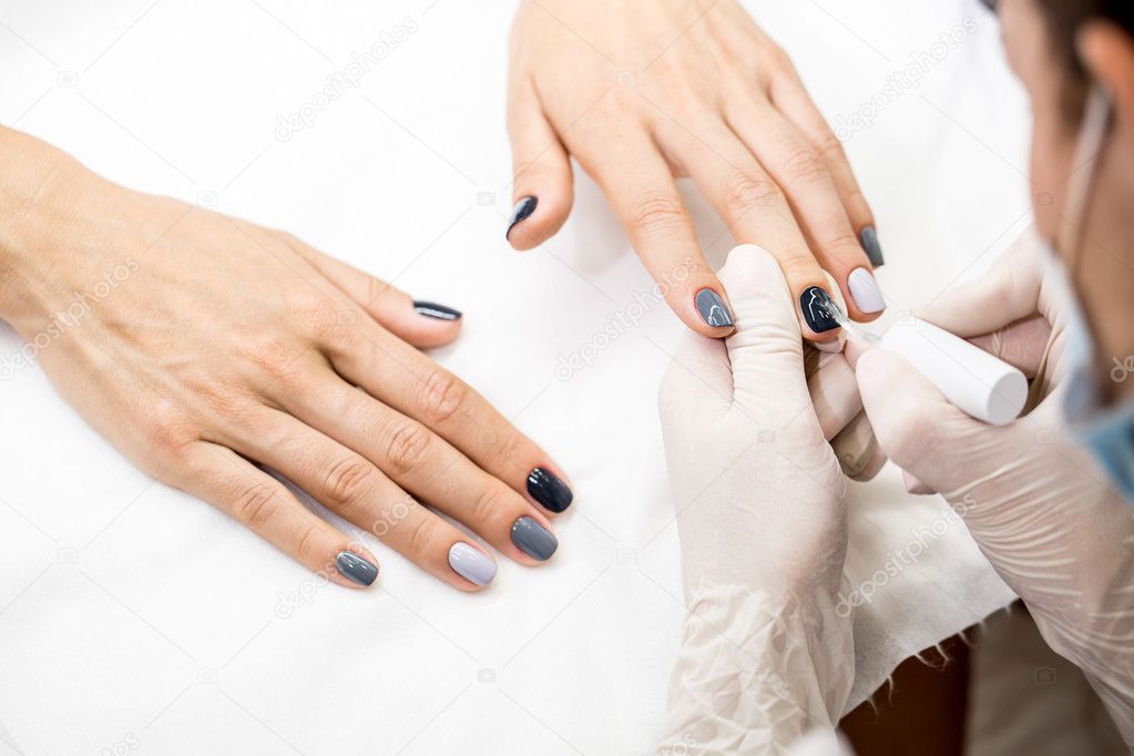 Master gets a new paint gray fingers on different Stock Photo by ...