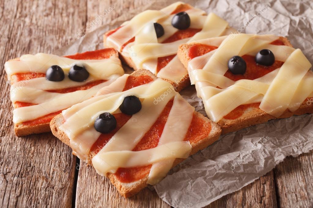 Terrible sandwiches for Halloween in the form of a mummy. horizo Stock ...