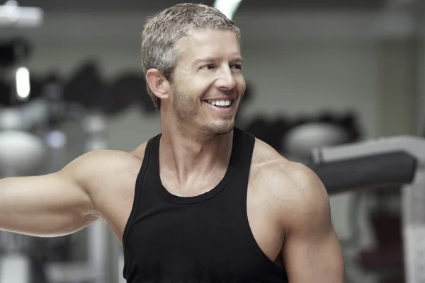 Handsome model portrait at gym - Stock Image - Everypixel