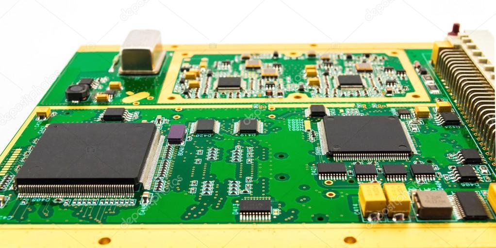 Green printed circuit board (PCB) Stock Photo by ©hemerocallis 100127350