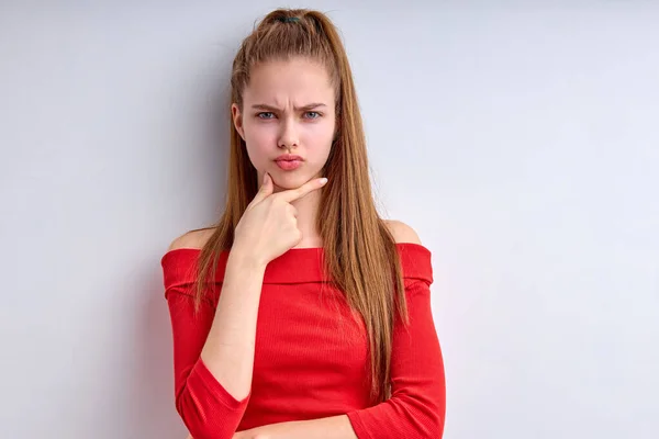 Puzzled perplexed young teen girl with distrustful face raising hands ...