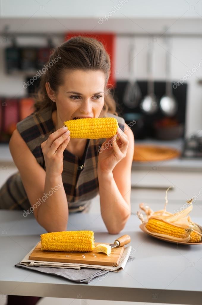 Woman Eating Corn On The Cob