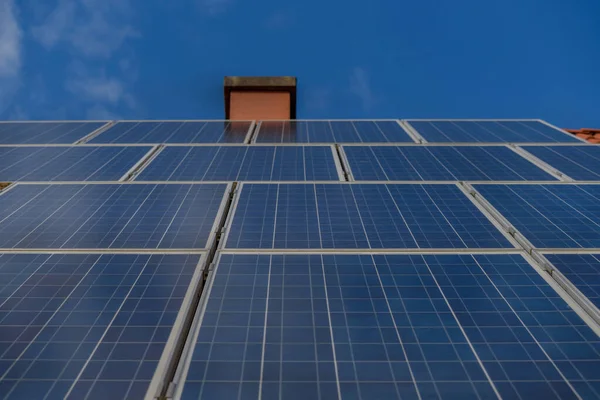 Solar panels on the red roof of a house. Solar panel, photovoltaic ...