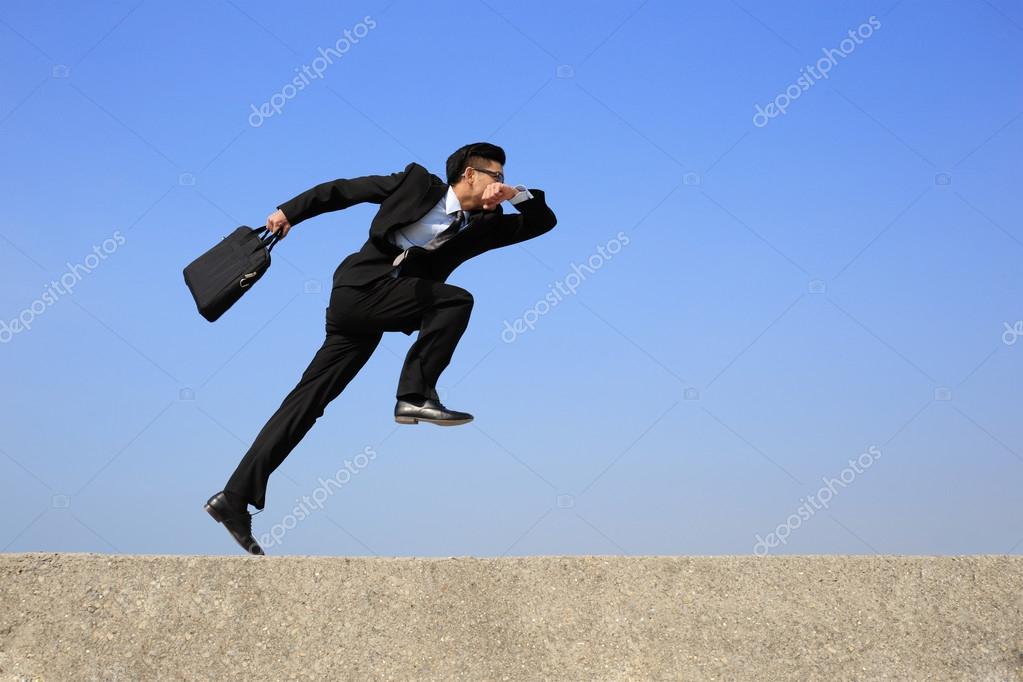 Business man jumping Stock Photo by ©ryanking999 65862667