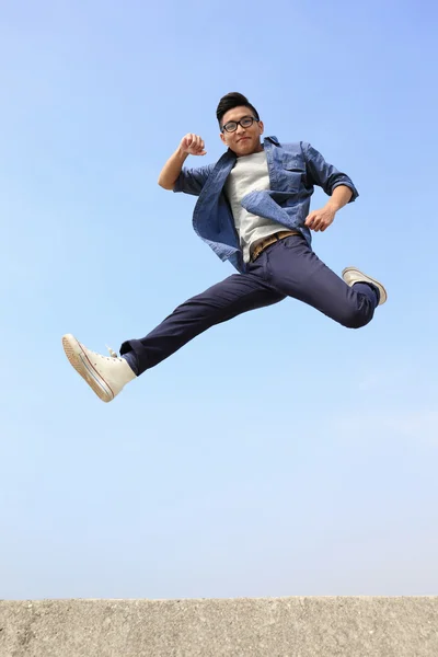 Happy man jumping ⬇ Stock Photo, Image by © ryanking999 #70135653