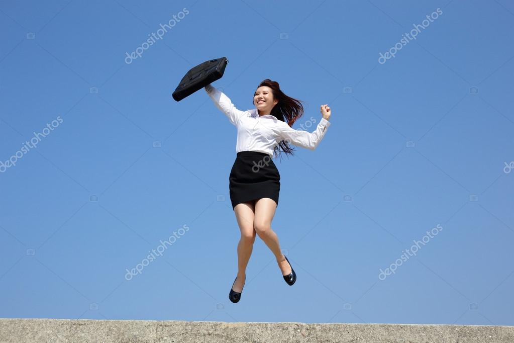 Happy Business Woman Jumping