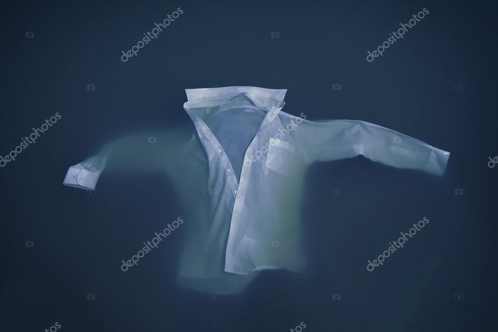 Men's button up shirt floating or sinking in water — Stock Photo ...