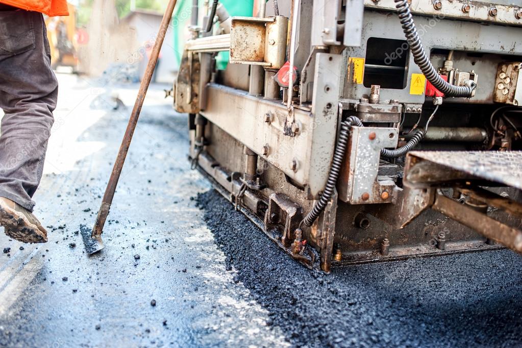 Road construction with tools, workers and industrial machinery — Stock ...