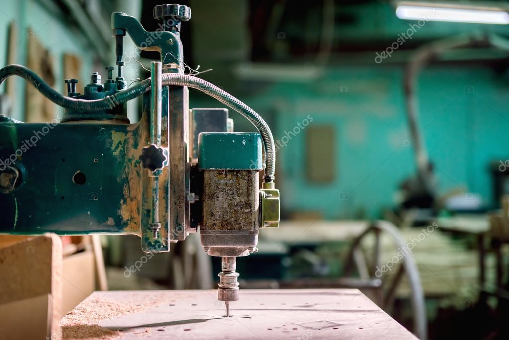 Industrial lathe tool, drilling and milling tool, iron drill in action ...