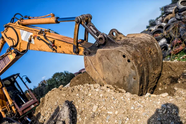 Demolishing operations at industrial construction site. worker using ...