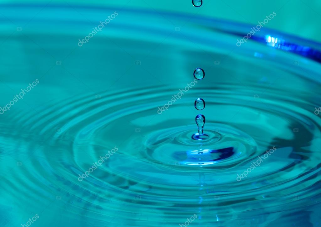 Water drop hitting the surface of a pool Stock Photo by ©jeffbanke 52254019