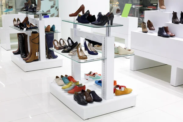 Interior of shoe store in modern european mall - Stock Image - Everypixel