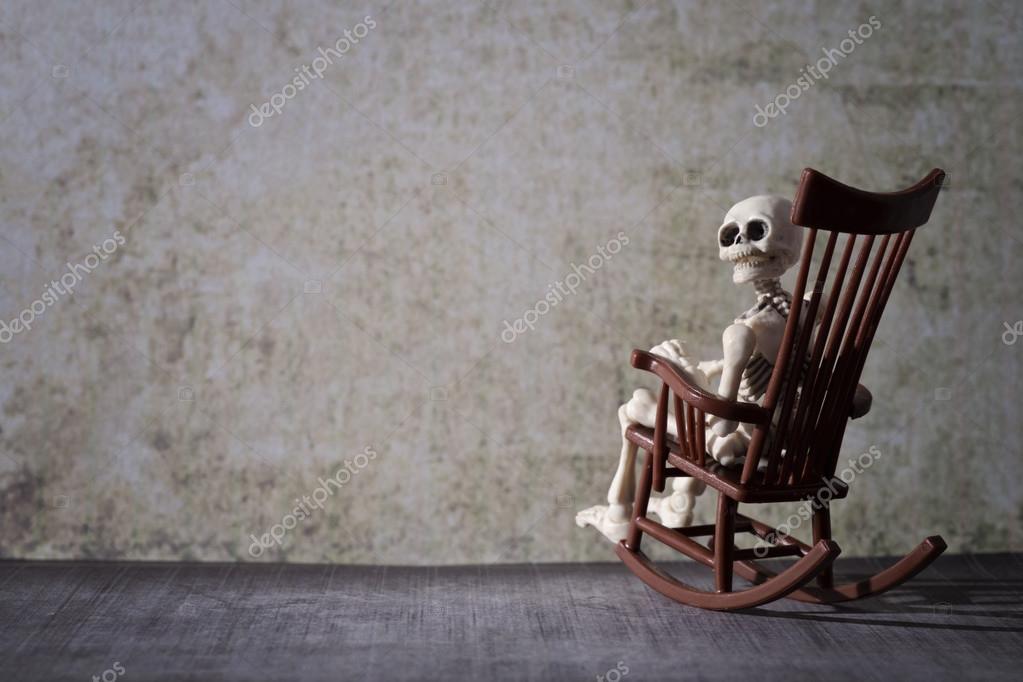 Skeleton on a rocking chair Stock Photo by ©ocipalla 123040978