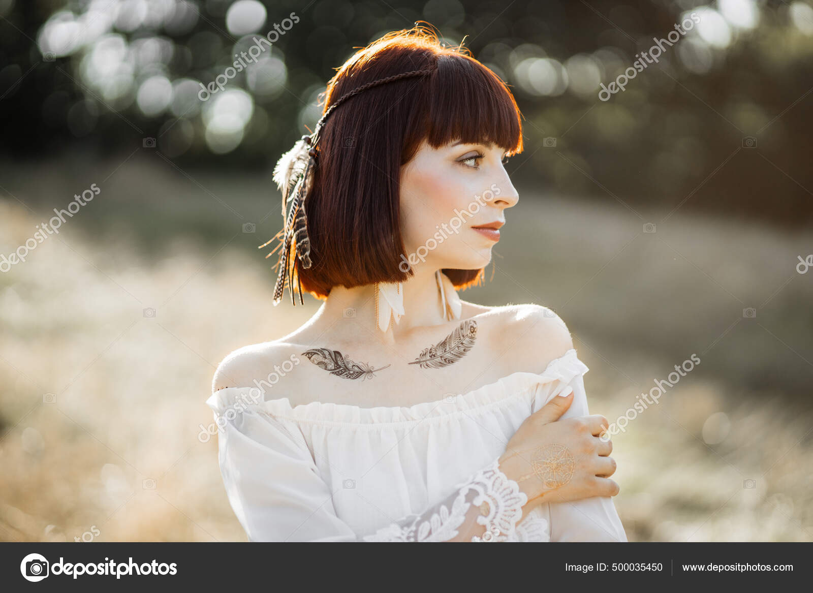 Native american woman in white dress, with feathers in hair and tattoos ...