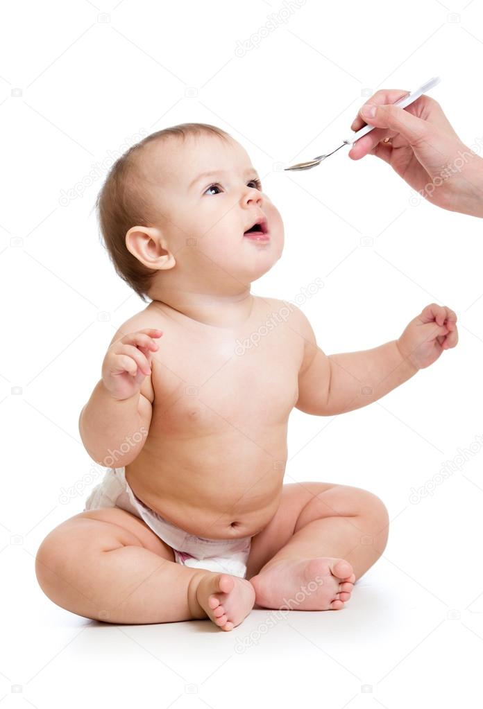 Hand feeding baby with a spoon — Stock Photo © oksun70 #63037005