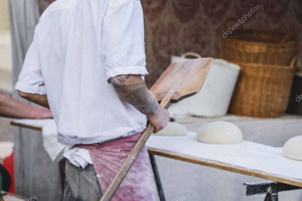 Artisan bread in ancient medieval fair, Spain Stock Photo by ...