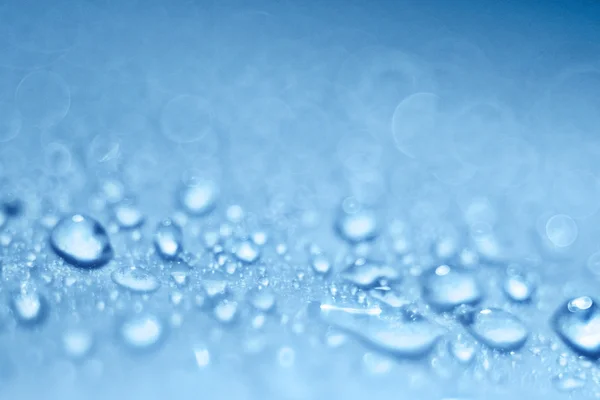 Blue drops background Stock Photo by ©xload 59999087